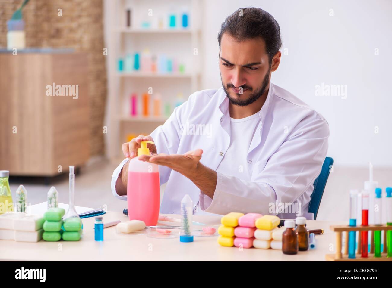 Young chemist testing soap in the lab Stock Photo - Alamy