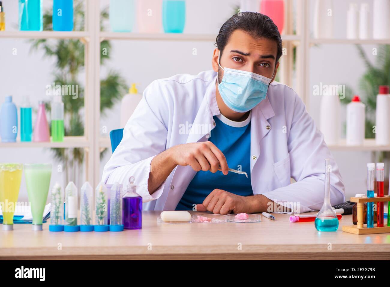 Young chemist testing soap in the lab Stock Photo - Alamy