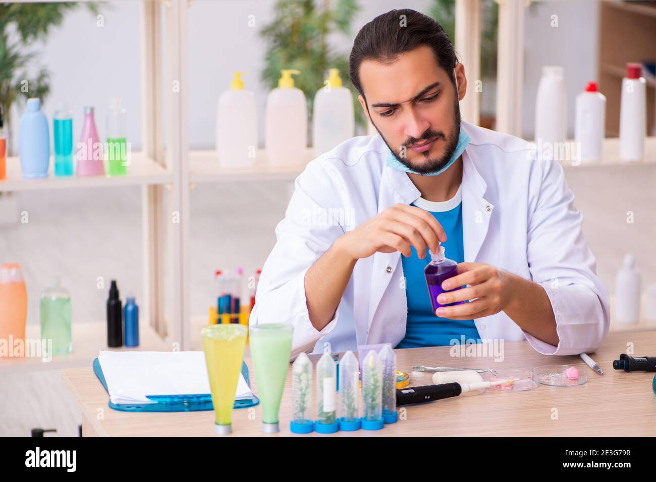 Young chemist testing soap in the lab Stock Photo - Alamy