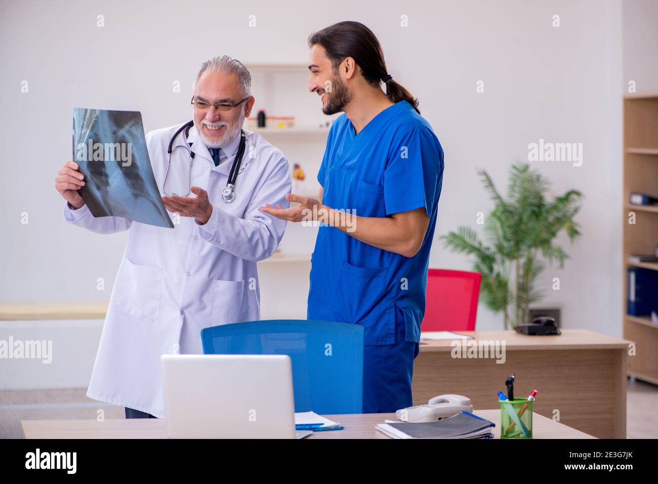Two doctors working in the hospital Stock Photo - Alamy
