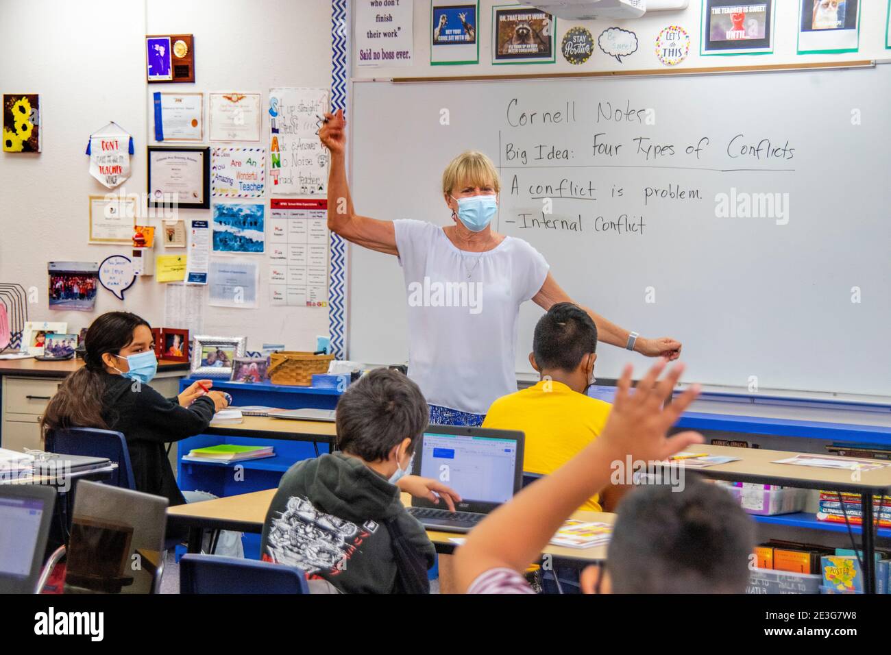 Wearing a face mask due to the coronavirus pandemic, a seventh grade ...