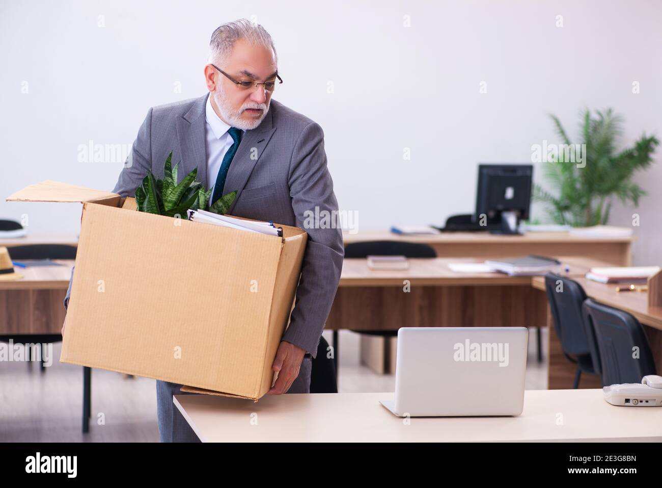 Old employee being fired from his work Stock Photo - Alamy