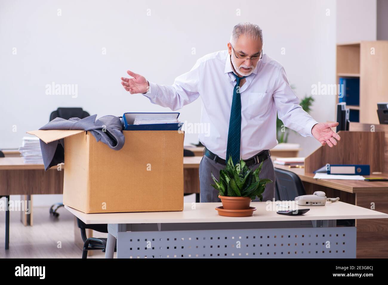 Old employee being fired from his work Stock Photo - Alamy