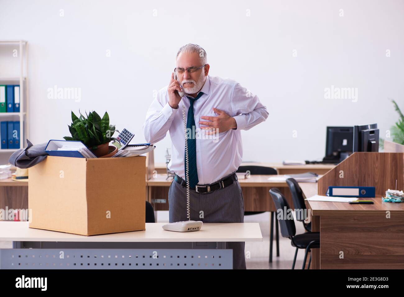 Old employee being fired from his work Stock Photo - Alamy