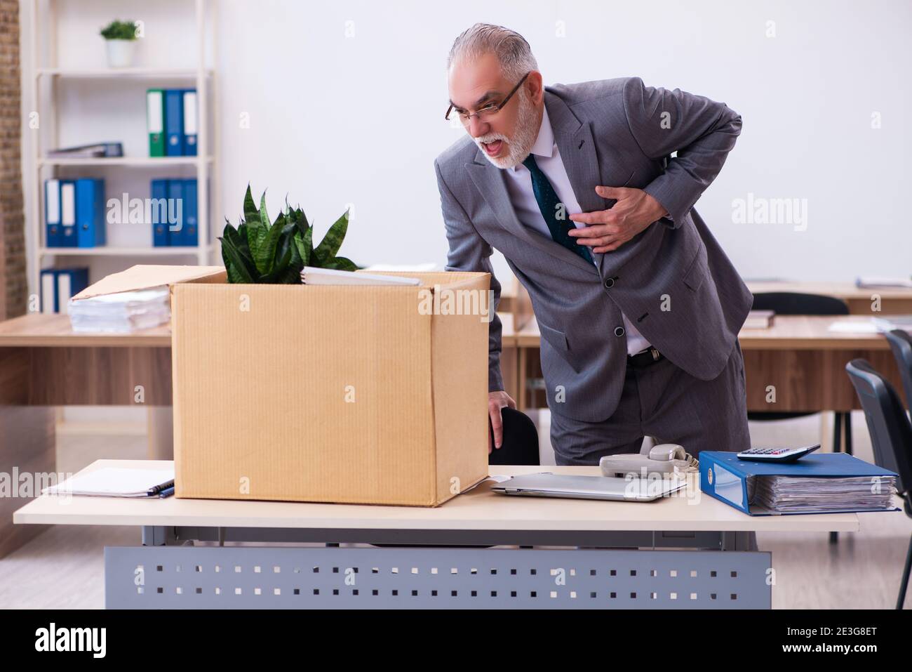 Old employee being fired from his work Stock Photo - Alamy