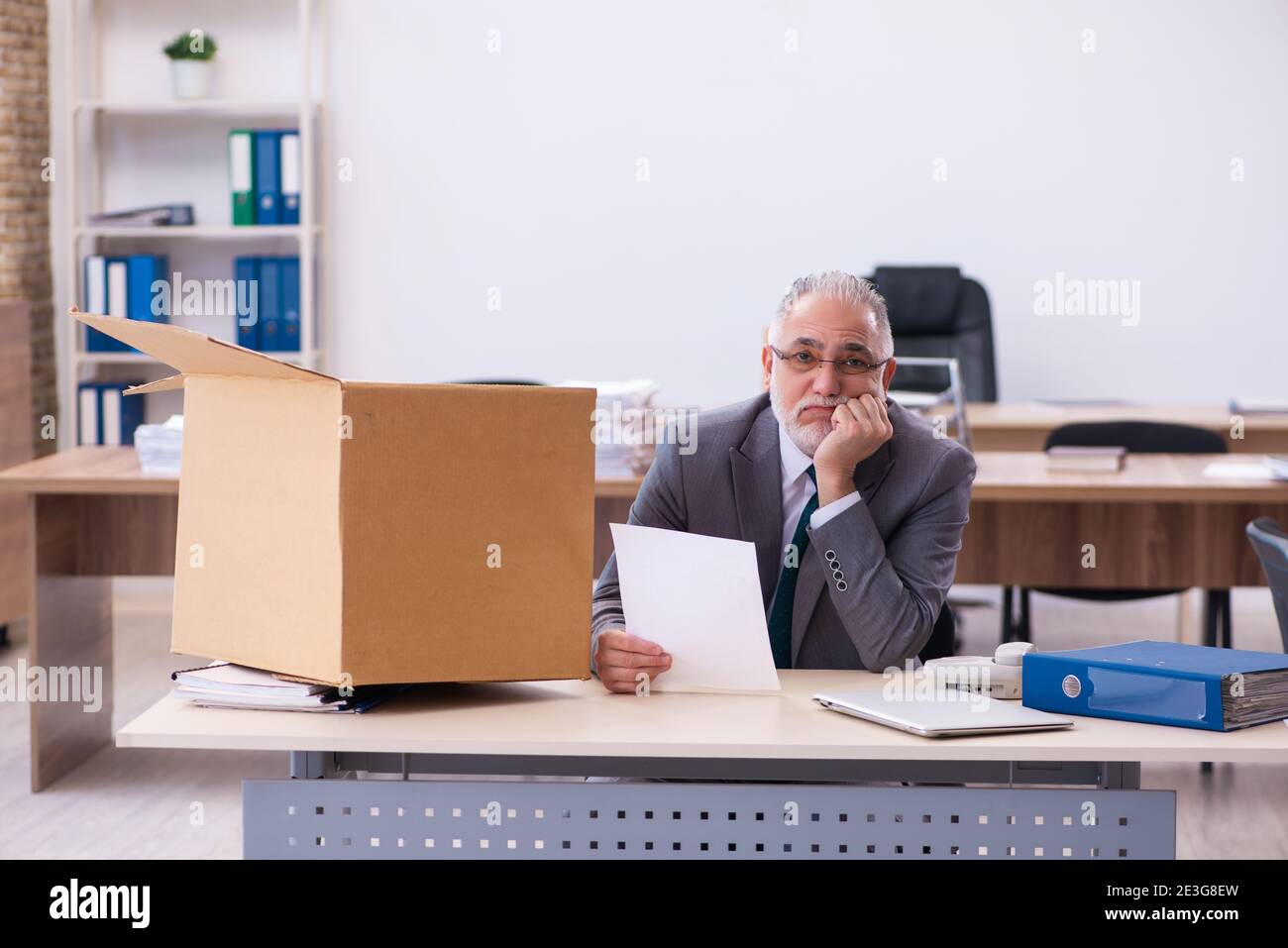 Old employee being fired from his work Stock Photo - Alamy