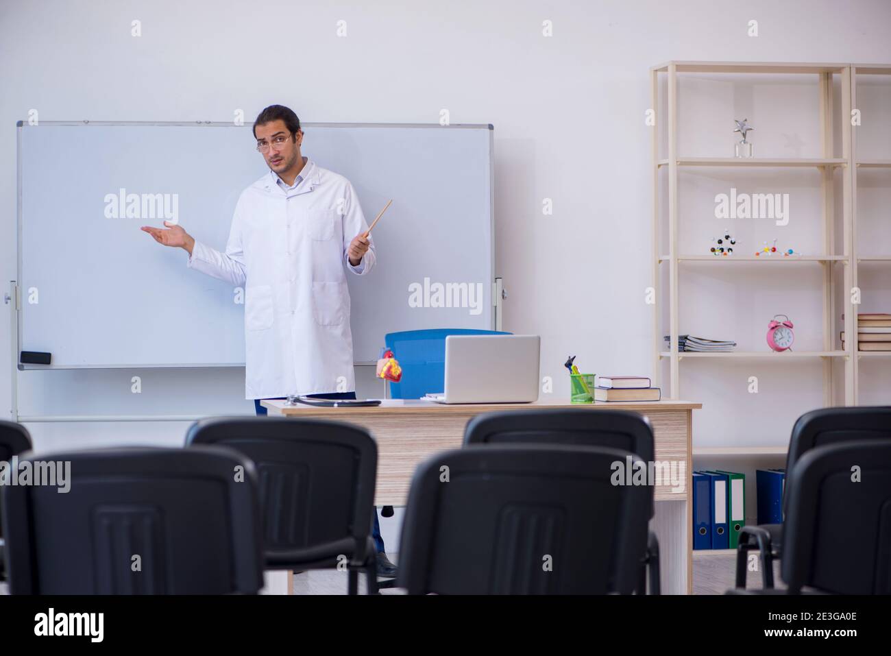 Young doctor giving seminar in the classroom Stock Photo - Alamy
