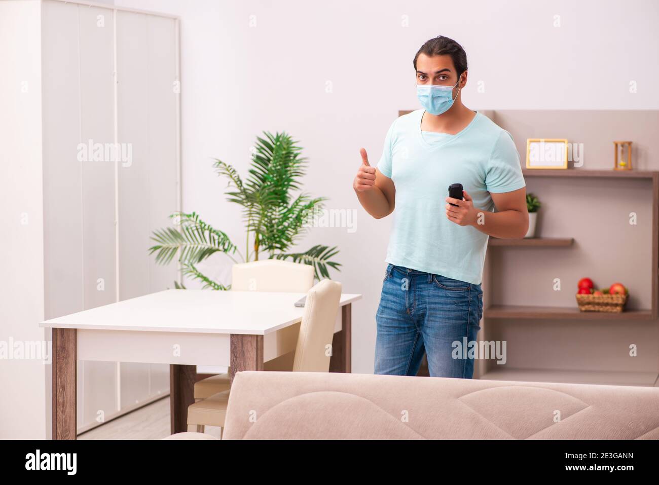 Young man student boring at home during pandemic Stock Photo - Alamy