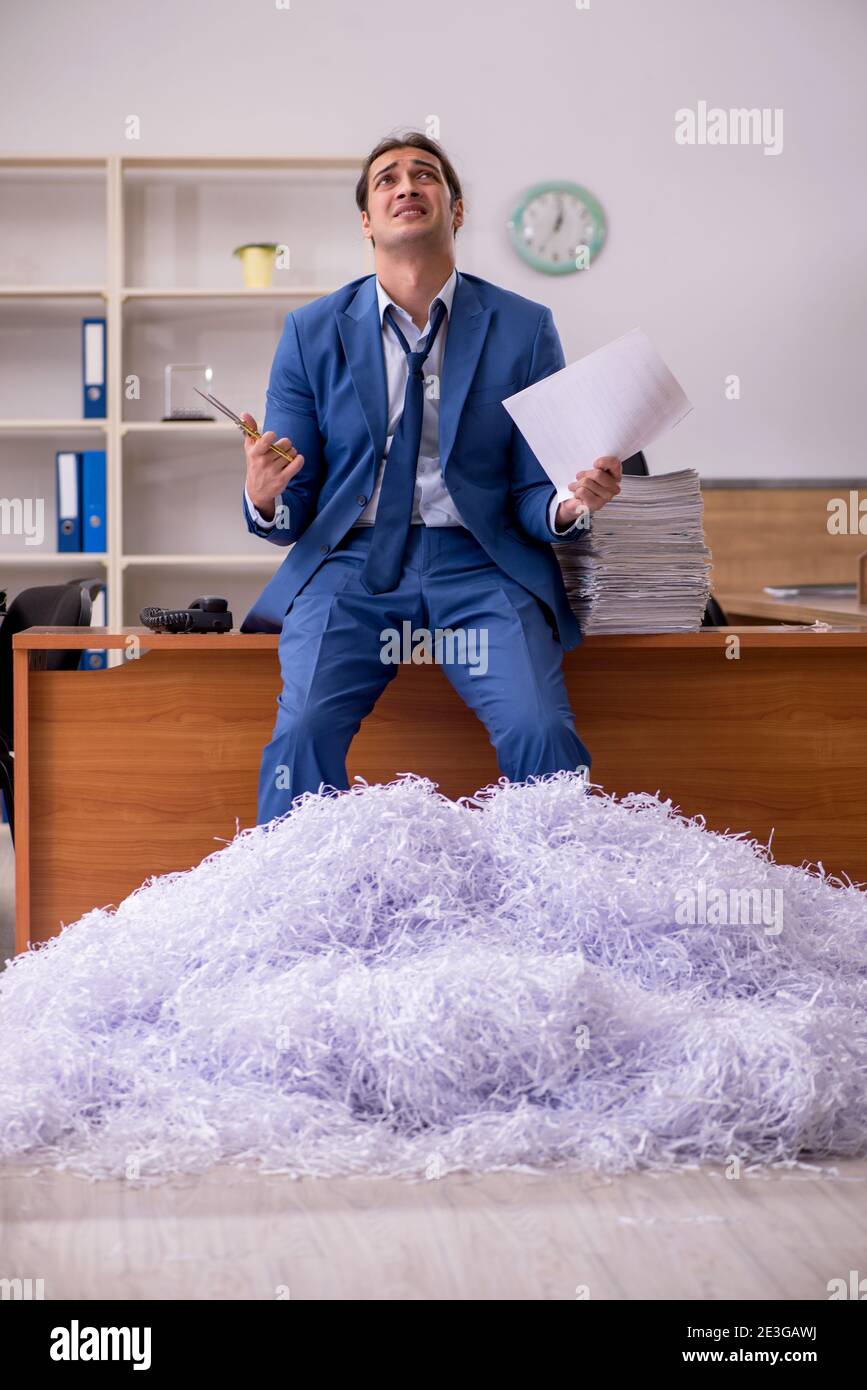 Paper shredder employee hi-res stock photography and images - Alamy