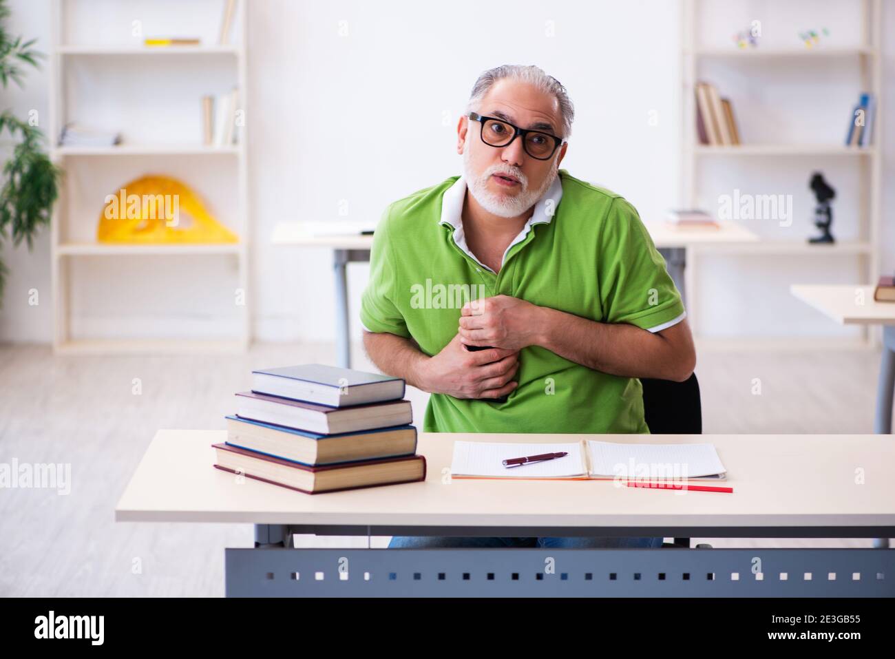 Senior male student preparing for exams in the classroom Stock Photo ...