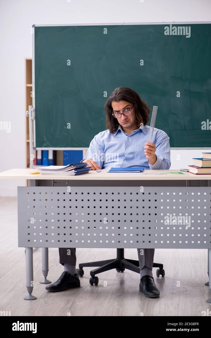 Angry teacher and ruler hi-res stock photography and images - Alamy