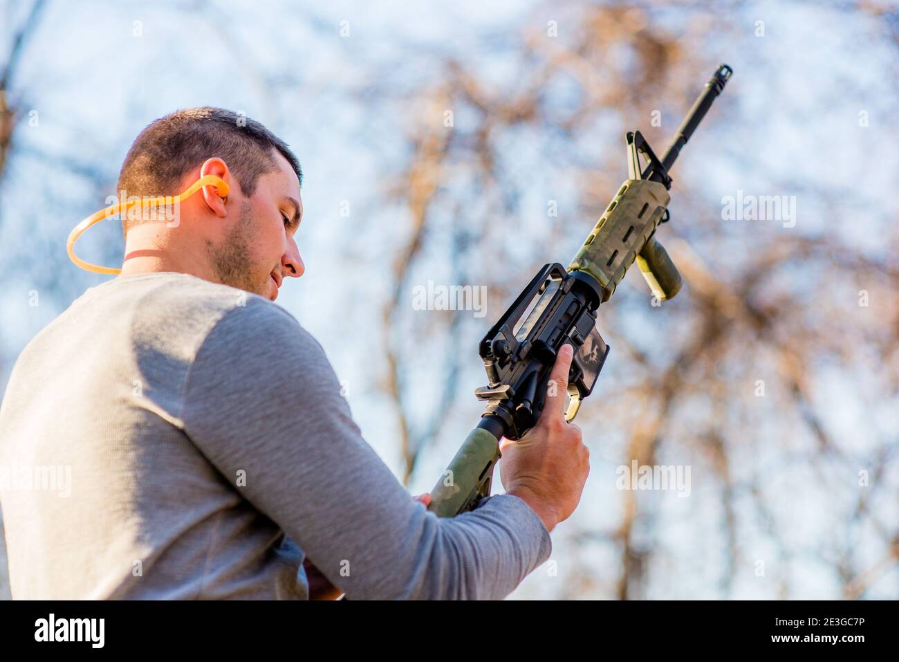 Weapon people with guns and leaves hi-res stock photography and images ...