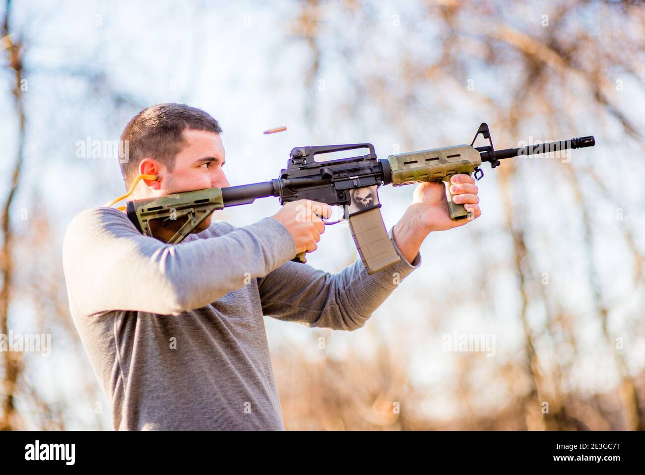 Weapon people with guns and leaves hi-res stock photography and images ...