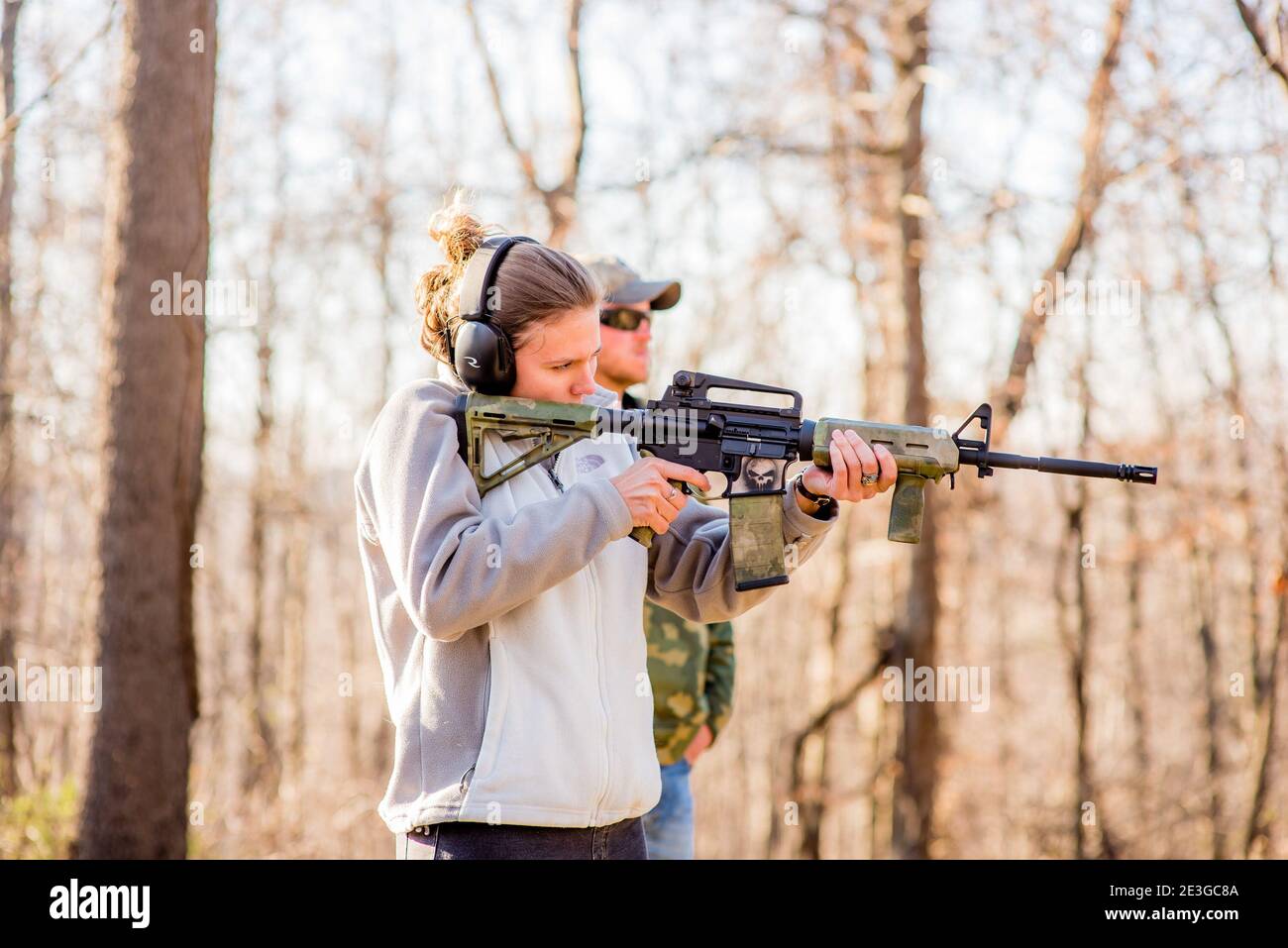 Weapon people with guns and leaves hi-res stock photography and images ...