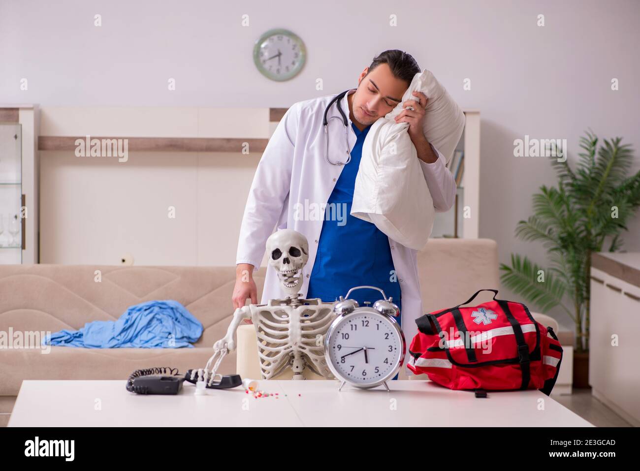 Male paramedic visiting skeleton patient Stock Photo - Alamy