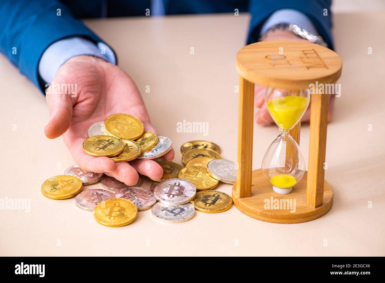 Man earning money via Internet in time management concept Stock Photo ...