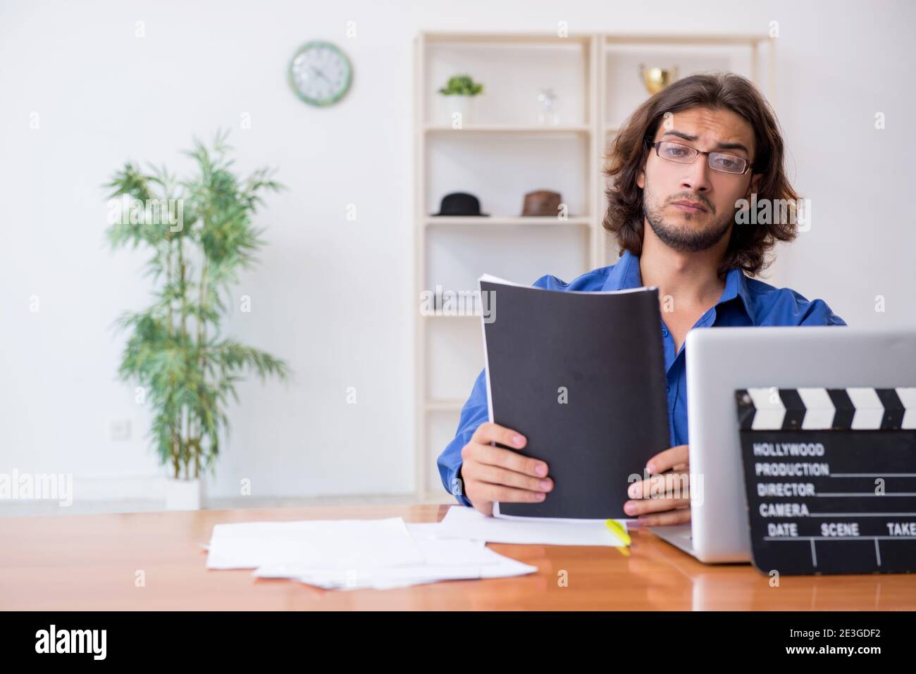 Movie director reading script hi-res stock photography and images - Alamy