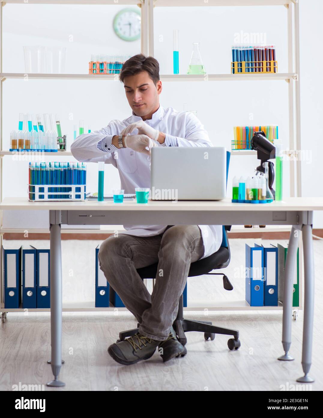 The man student working in chemical lab on experiment Stock Photo - Alamy