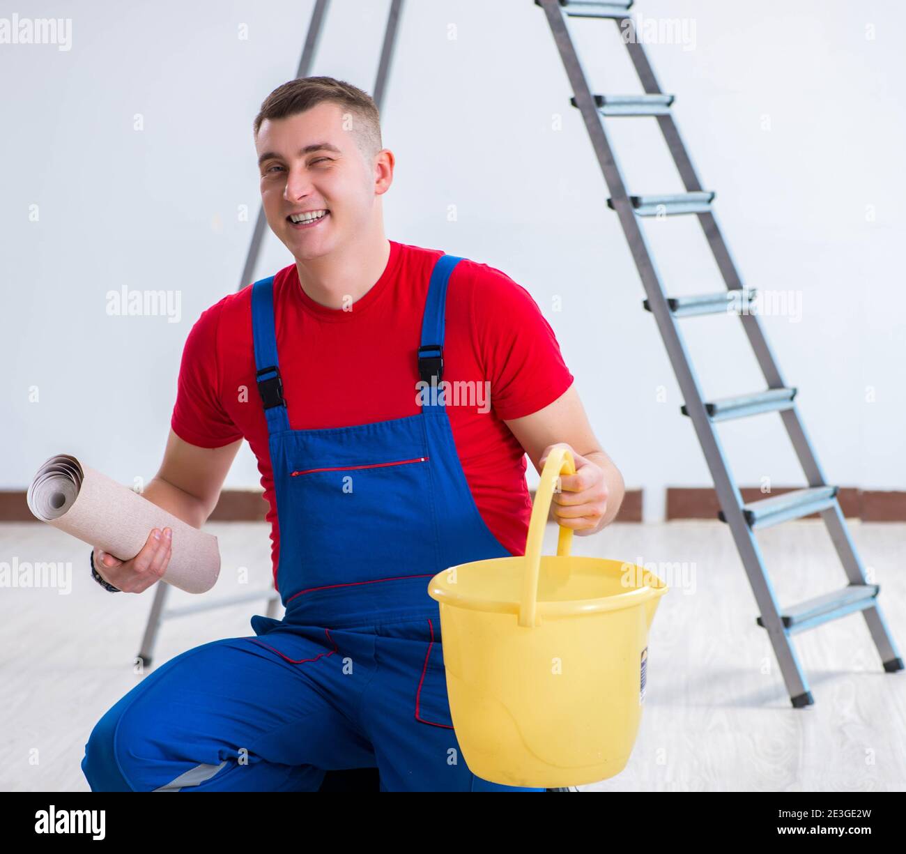 The contractor worker preparing for wallpaper decoration Stock Photo ...