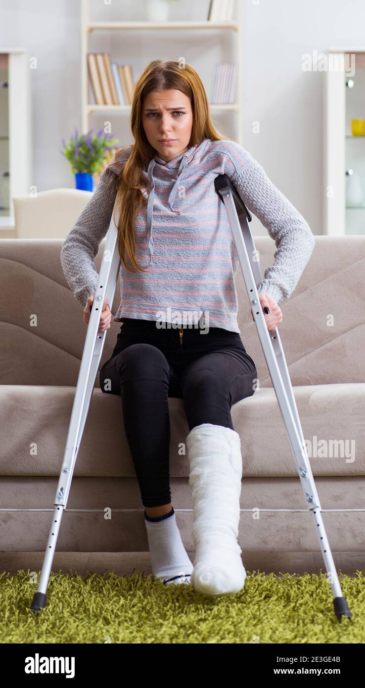 The young woman with broken leg at home Stock Photo - Alamy