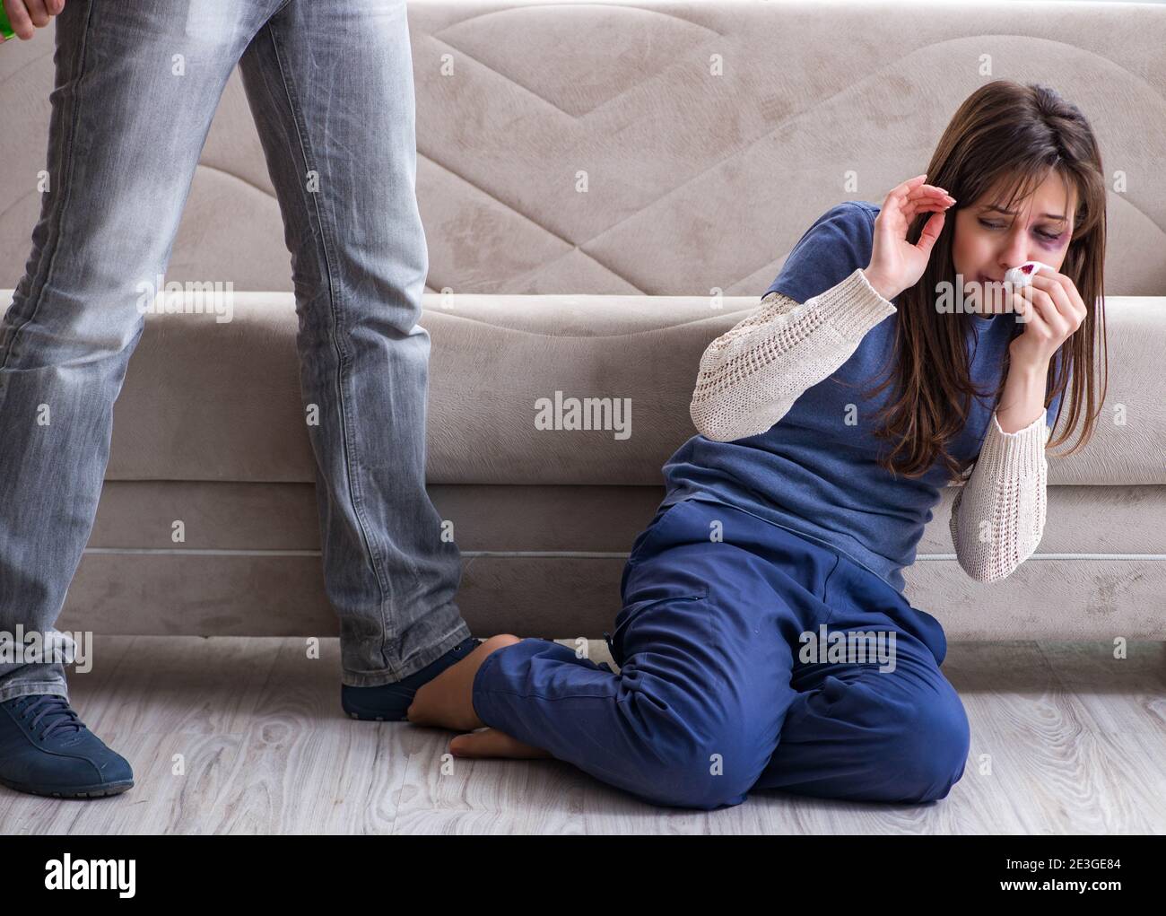 Desparate wife with aggressive husband in domestic violence concept ...