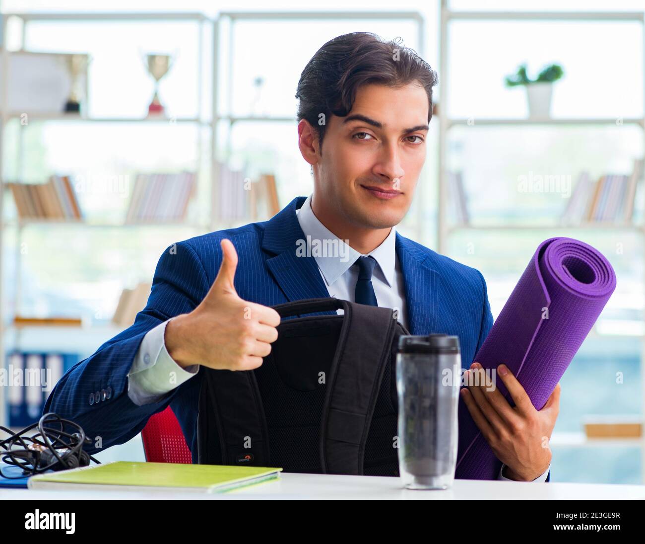 The man getting ready for sports break in the office Stock Photo - Alamy