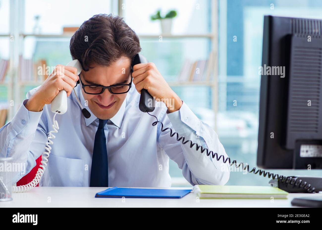 The unhappy angry call center worker frustrated with workload Stock ...