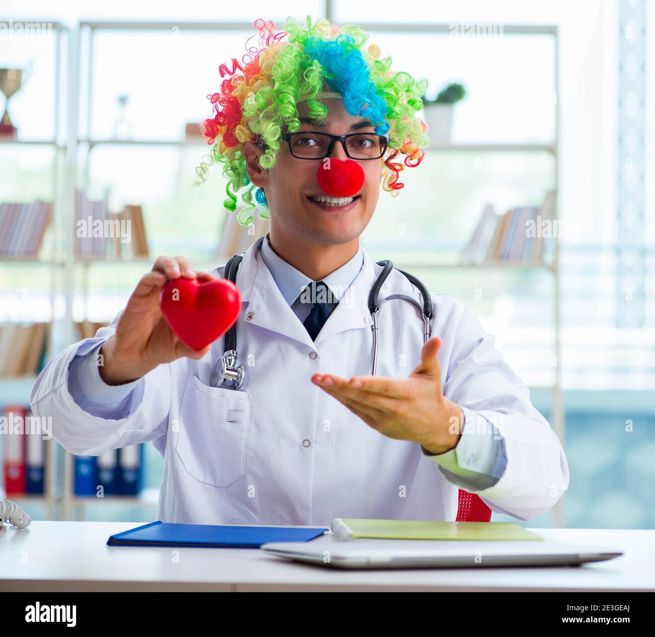 The child cardiologist with stethoscope and red heart Stock Photo - Alamy