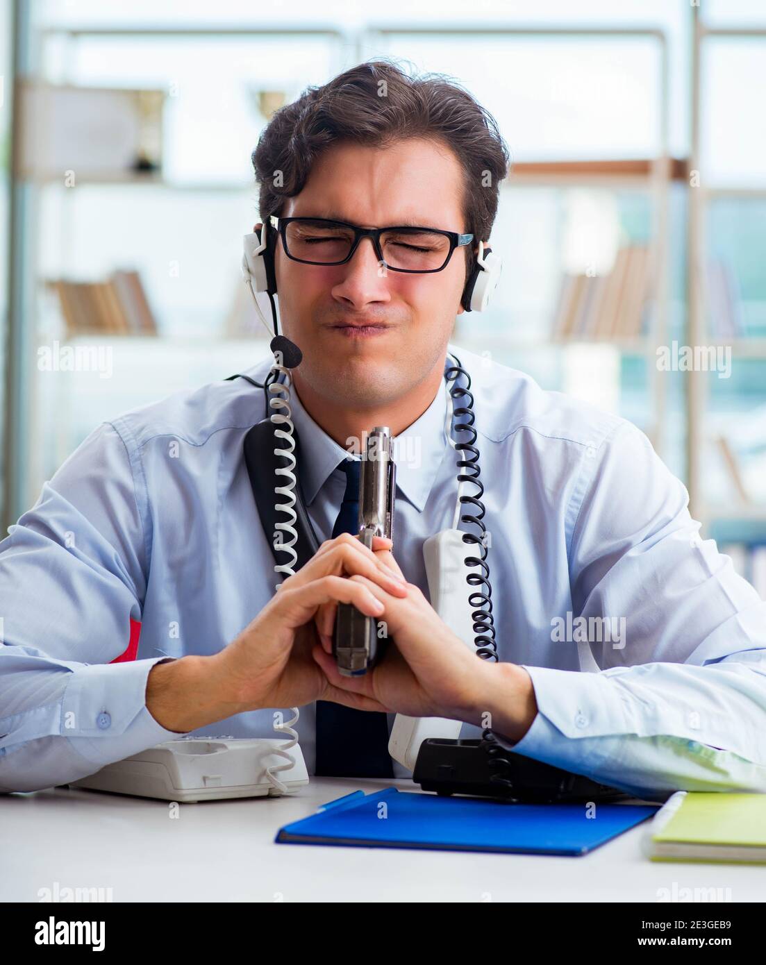 The unhappy angry call center worker frustrated with workload Stock ...