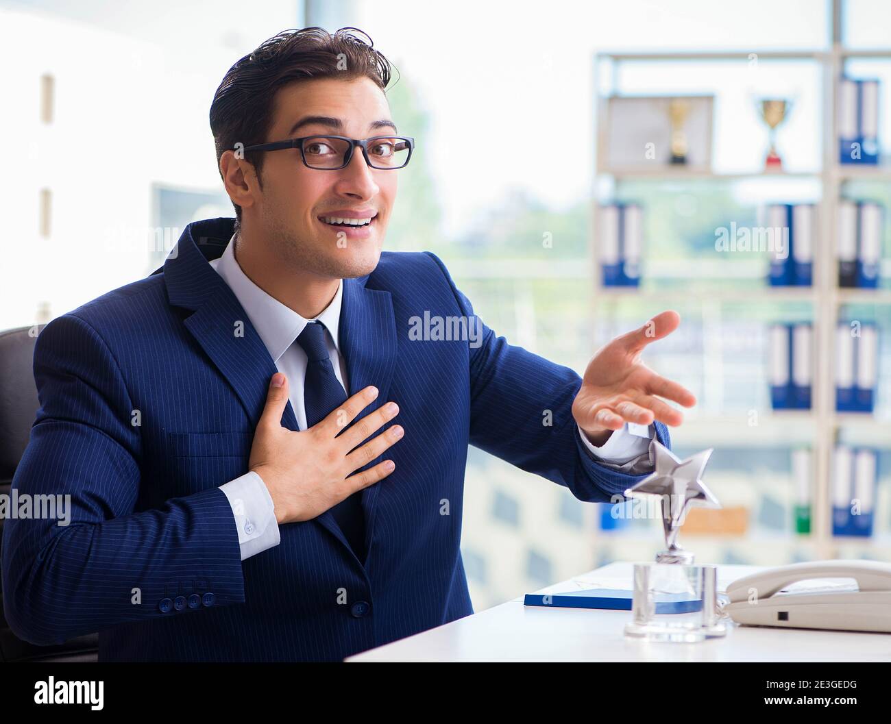 The businessman winning best employee of the month award Stock Photo ...