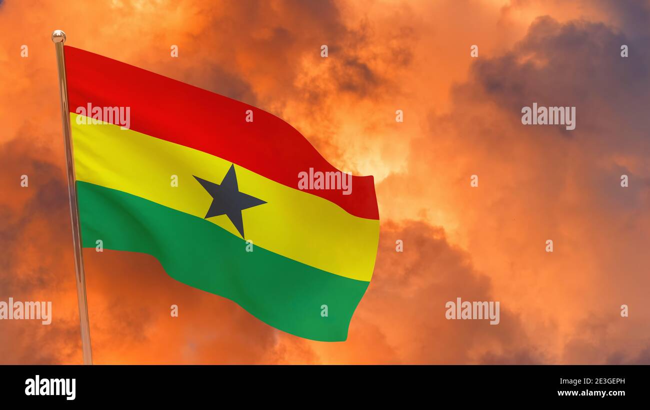 Ghana flag on pole. Dramatic background. National flag of Ghana Stock ...
