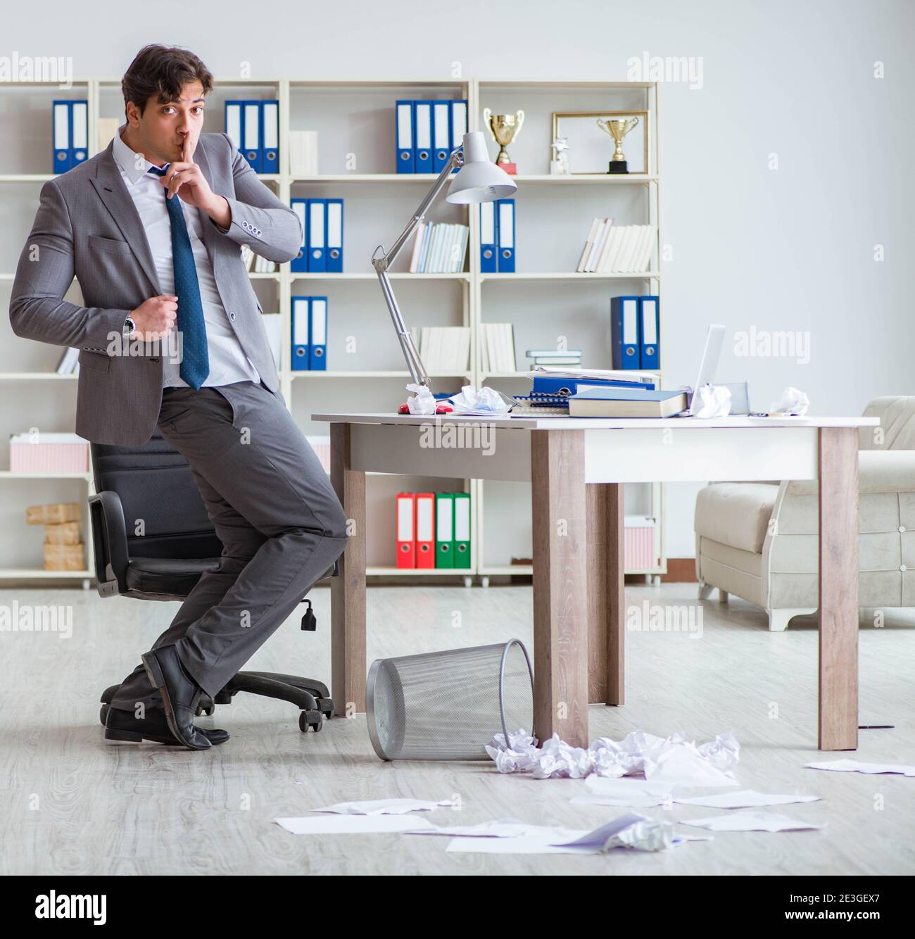 The businessman having fun taking a break in the office at work Stock ...
