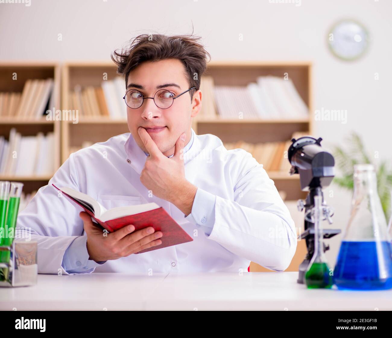 The mad crazy scientist doctor doing experiments in a laboratory Stock ...