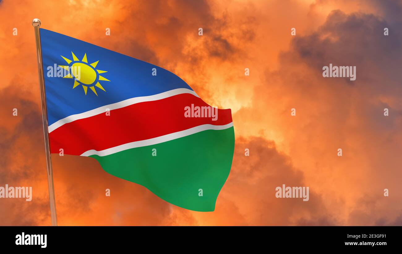 Namibia flag on pole. Dramatic background. National flag of Namibia ...