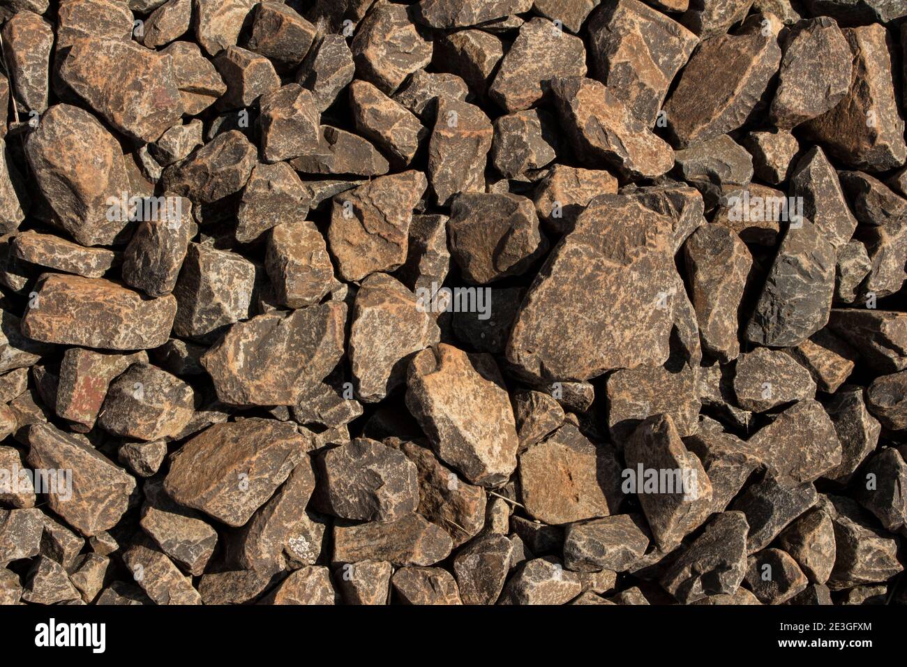 Group of dry greys rocks and stones forming a texture Stock Photo - Alamy
