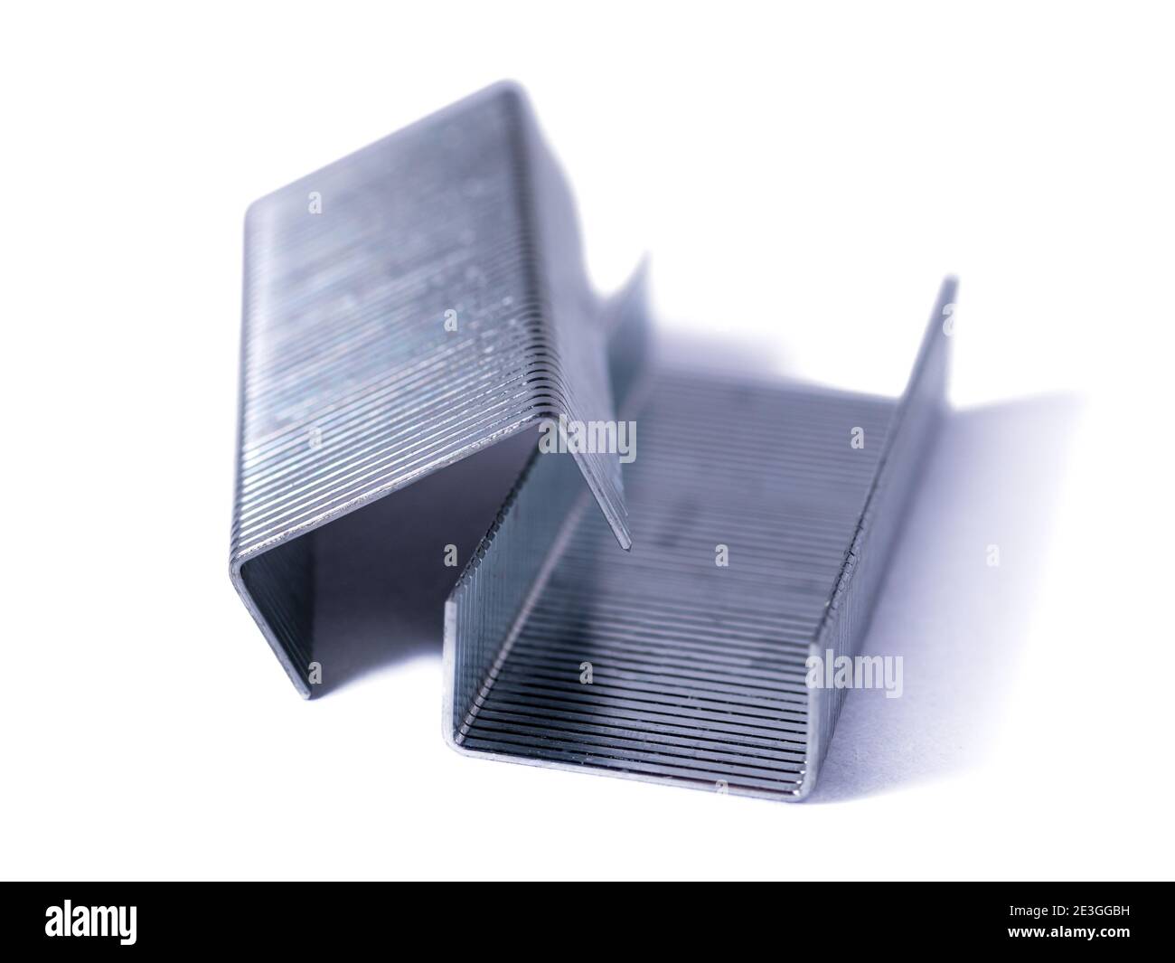 Blue stapler and staples Isolated on white background. Object Stock ...