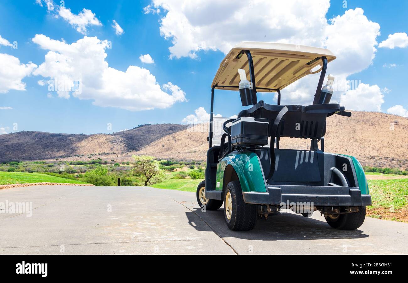 Golf cart on a golf course Stock Photo - Alamy