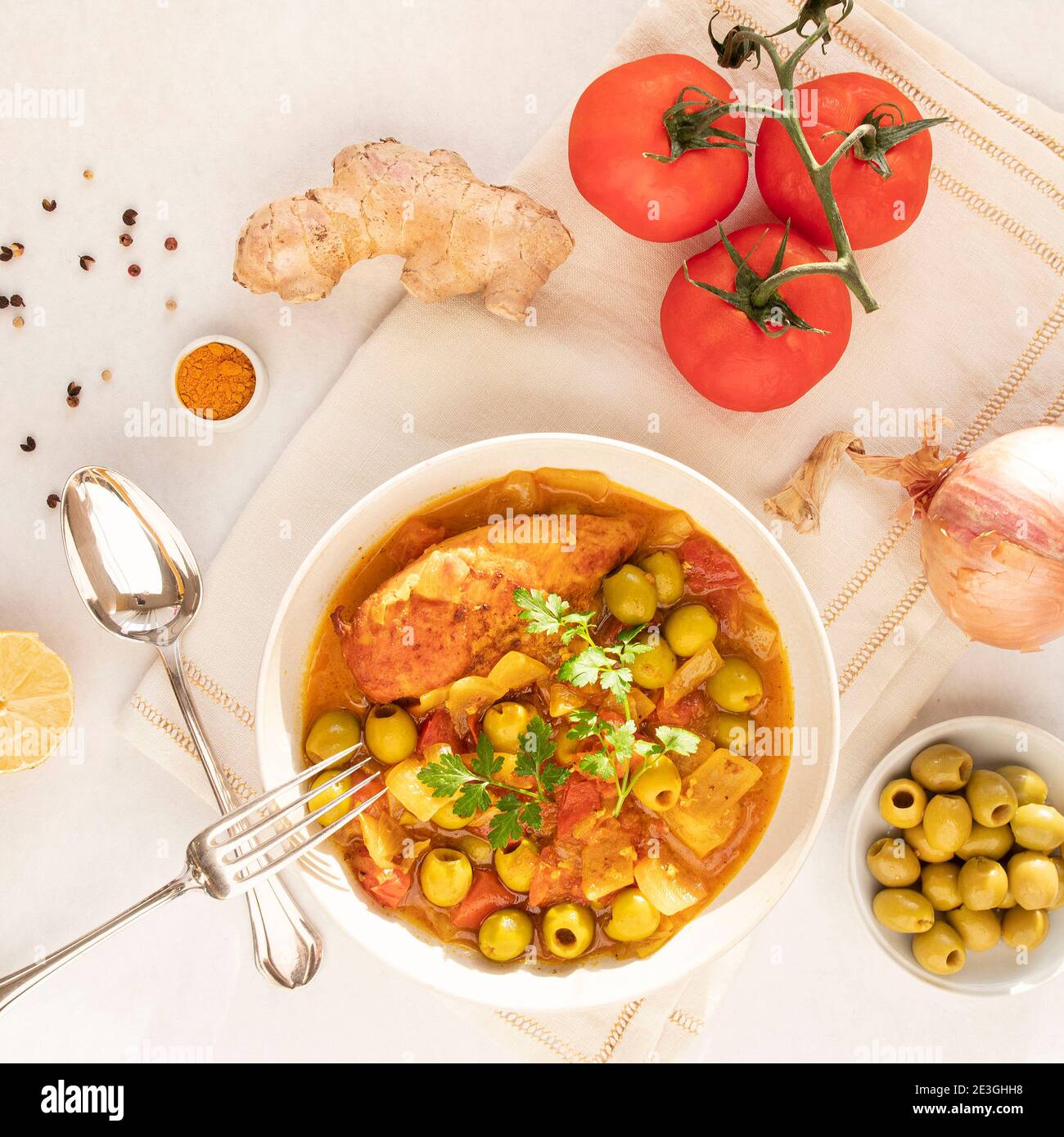 Traditional tagine plate with chicken, lemon and olive Stock Photo - Alamy