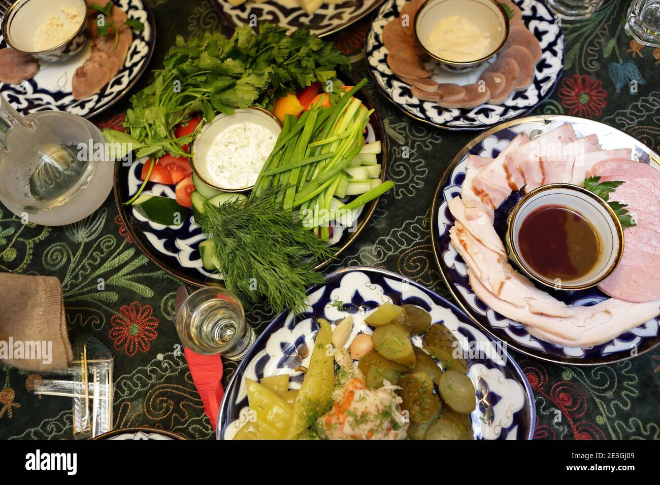 Plates with various appetizers in the uzbek restaurant Stock Photo - Alamy