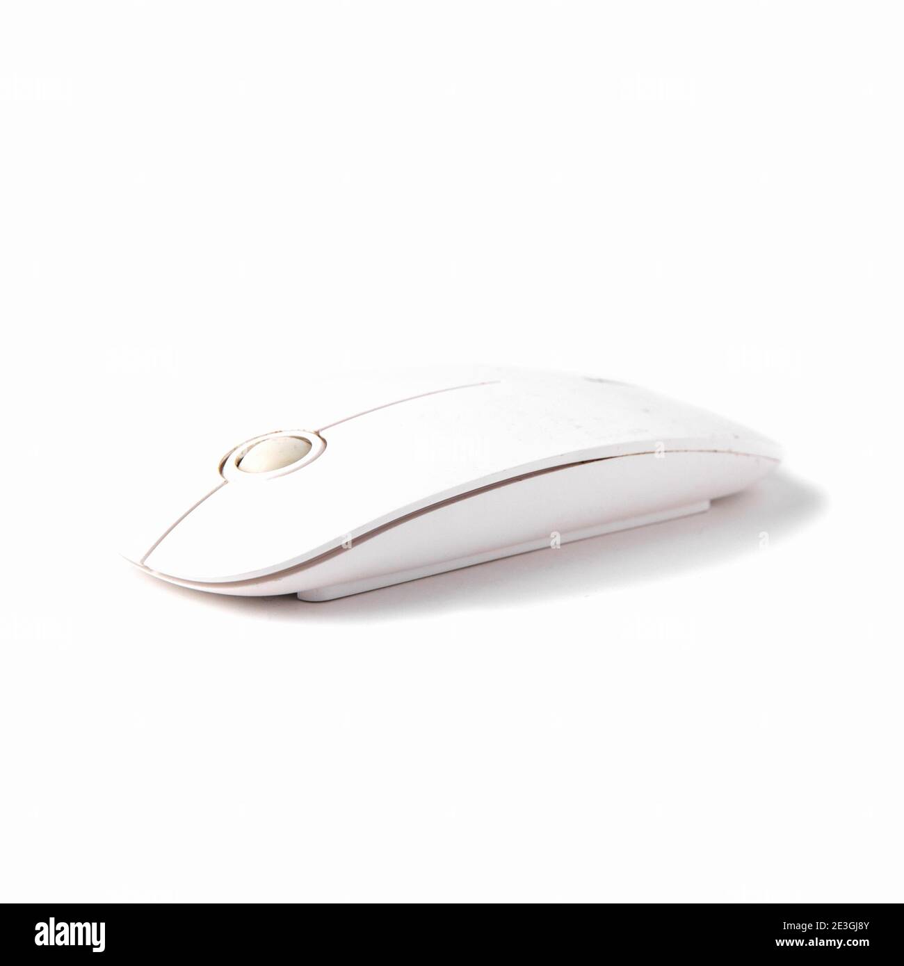 White wireless computer mouse. Isolated on a white background. Side ...