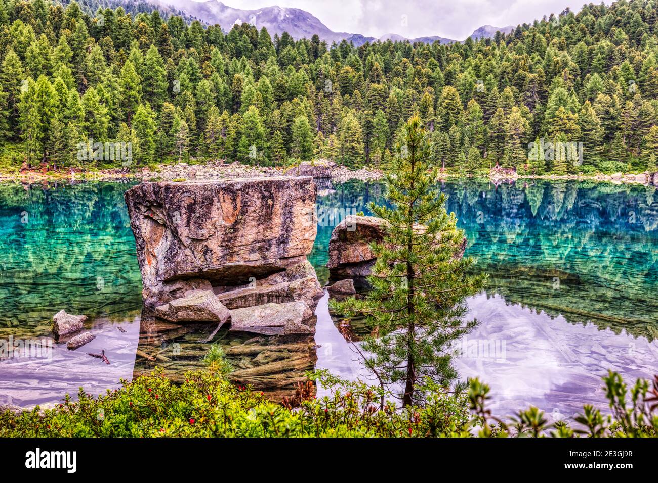 Beautiful reflections in swiss alps lake Lago di Saoseo, HDR Stock ...