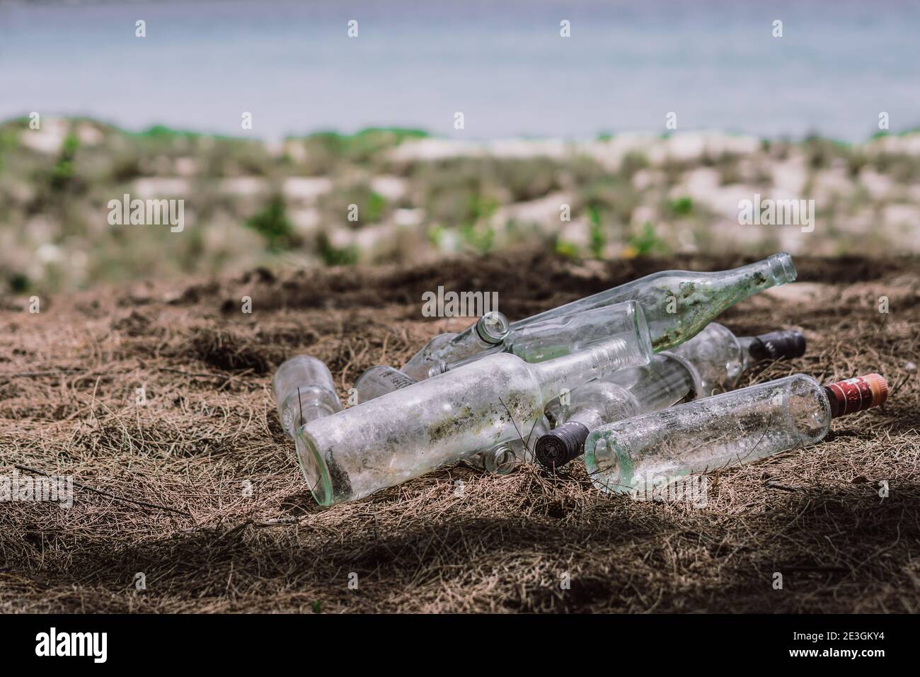 Close landfill old dirty transparent discarded empty glass alcohol ...