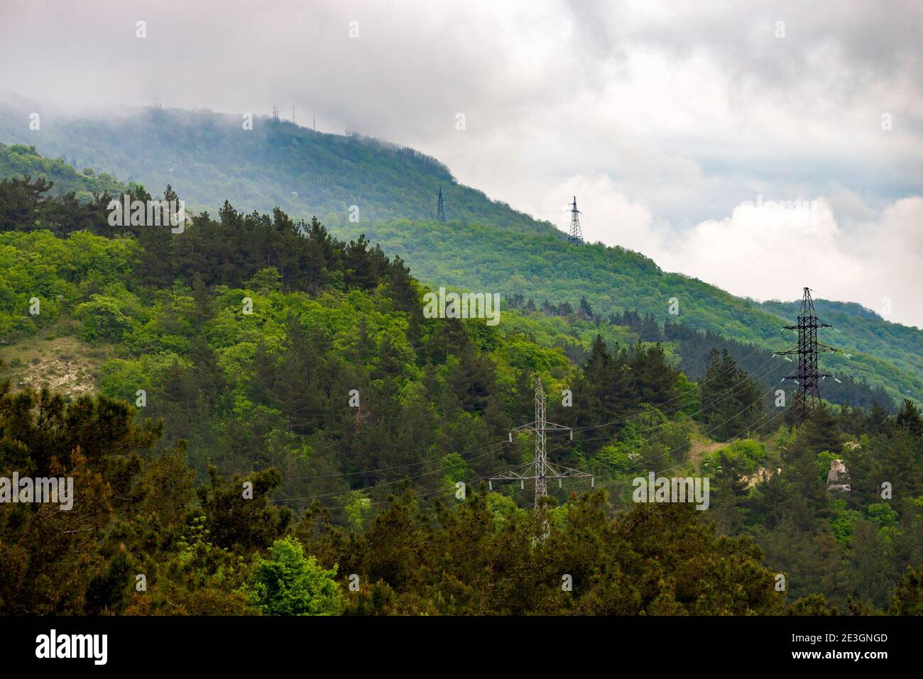 Beautiful natural park high tension lines and pylons Stock Photo - Alamy