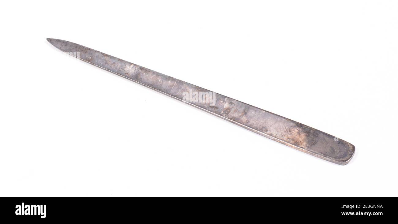 Old letter opener isolated on a white background Stock Photo - Alamy