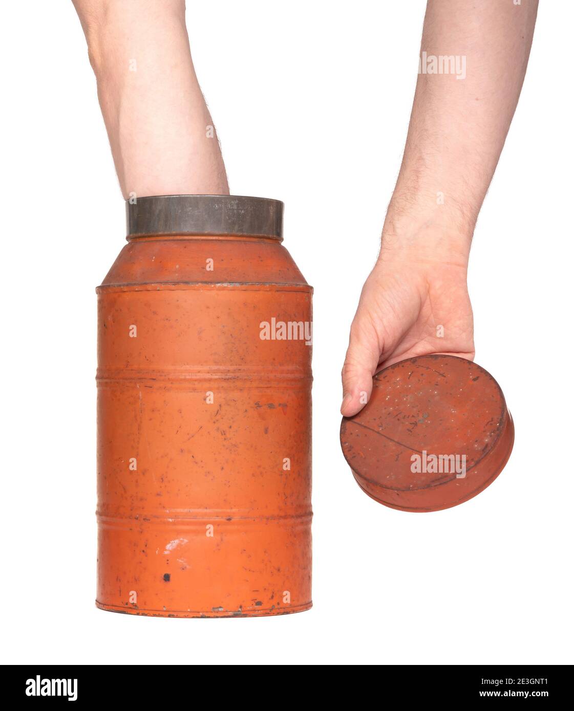 Hand in old nostalgic can isolated on white - Orange can Stock Photo ...