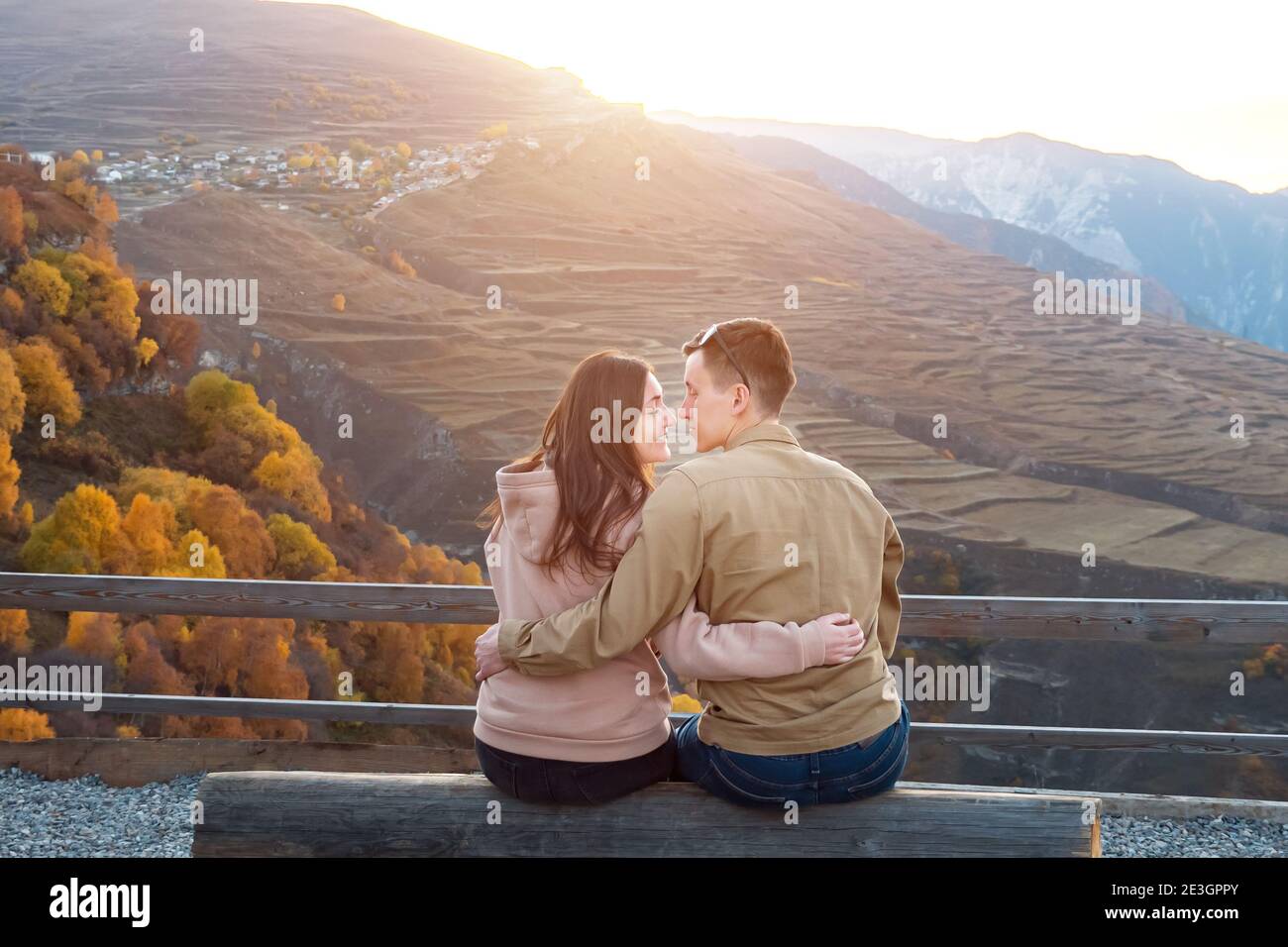 Couple landscape sitting backside hi-res stock photography and images ...