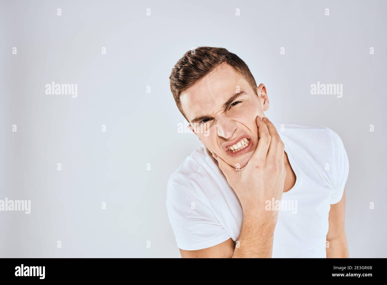 emotional man gesturing with his hands displeased facial expression ...