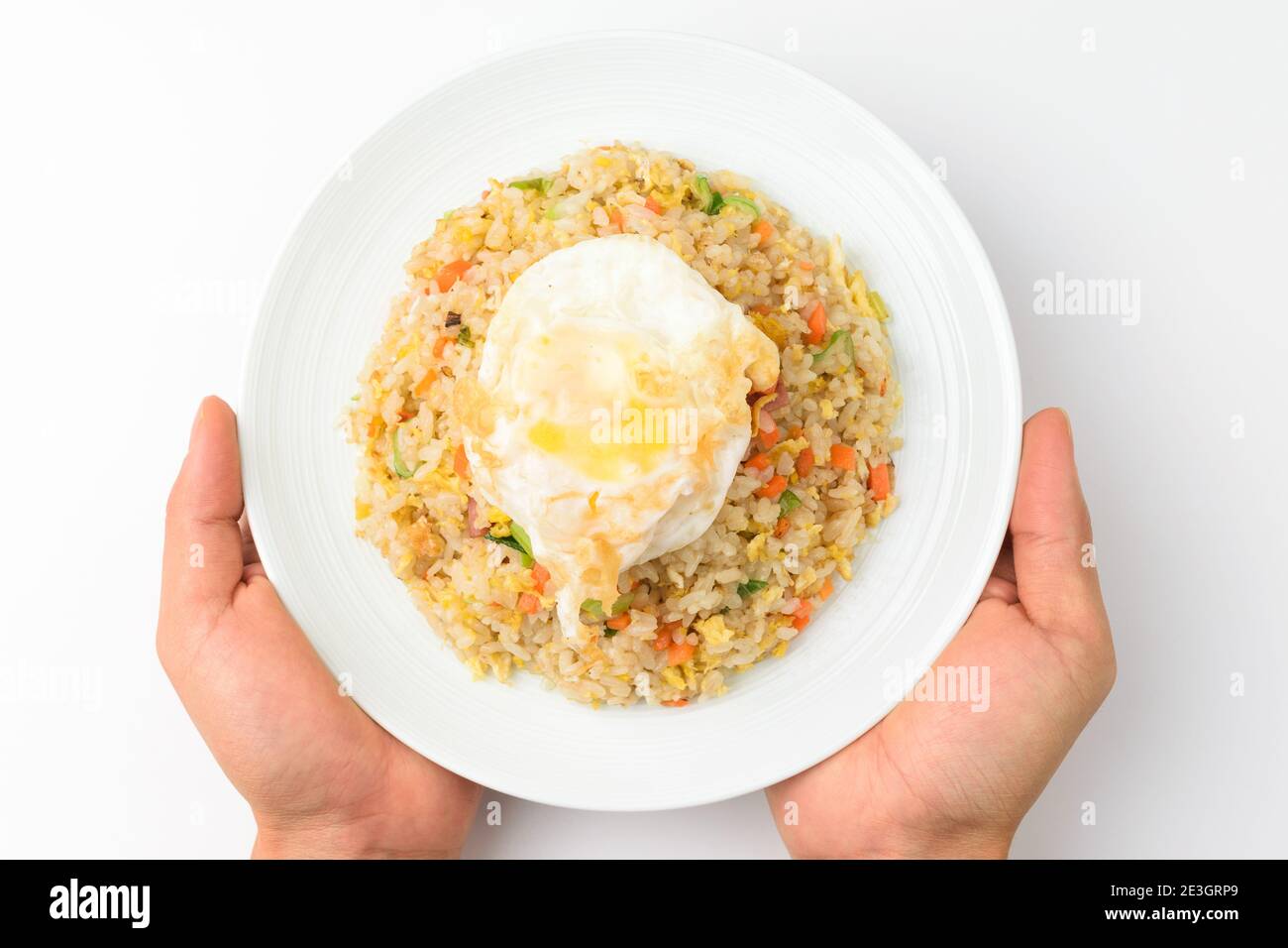 Seasoned fried rice on white background Stock Photo - Alamy