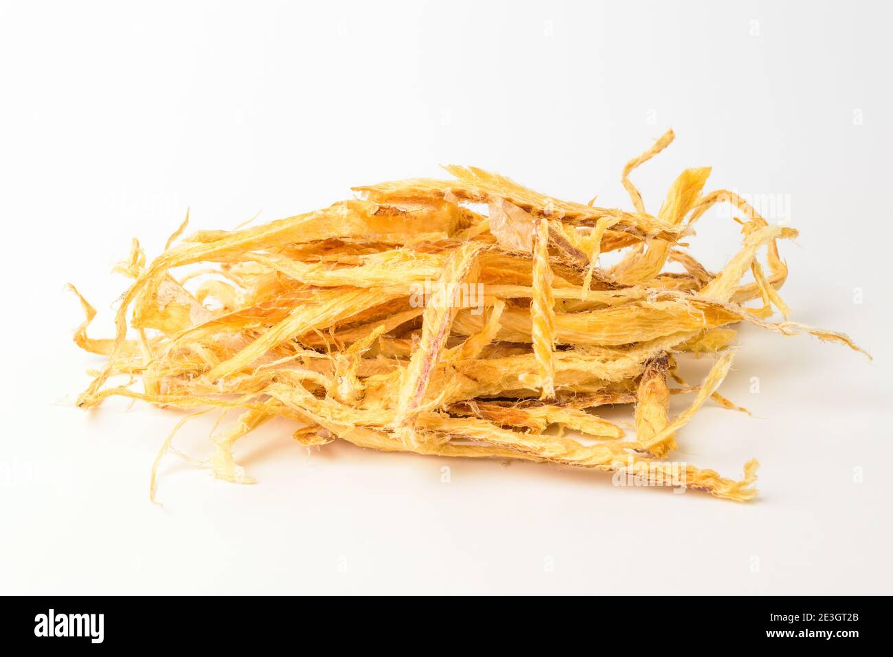 Dried pollack on white background Stock Photo - Alamy