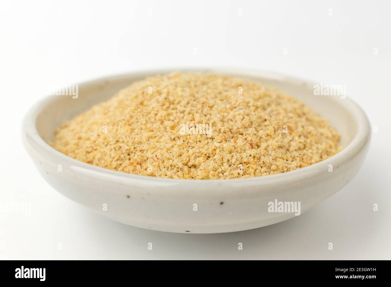 Perilla powder on a white background Stock Photo - Alamy